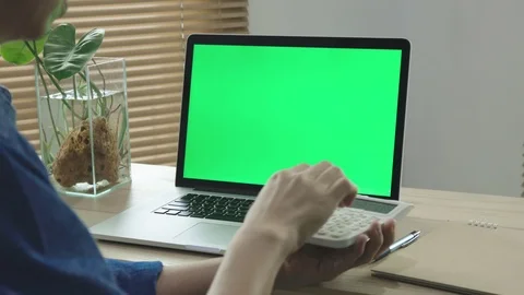 Over the shoulder shot of man typing on ... | Stock Video | Pond5