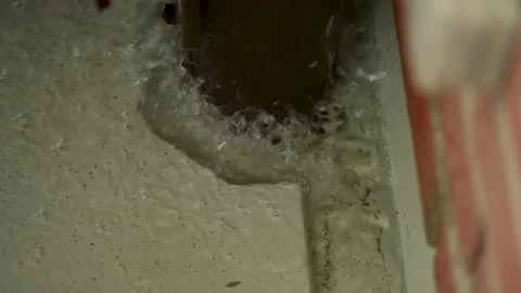 Overflowing drainage downpipe and overfi... | Stock Video | Pond5