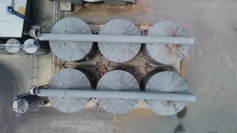 Overhead aerial view of rice silos locat... | Stock Video | Pond5