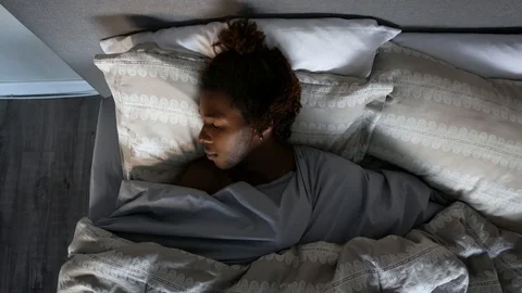 Overhead of African American man tossing... | Stock Video | Pond5