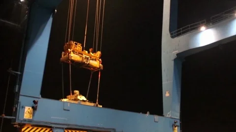 Overhead gantry crane lifting U.S. Army ... | Stock Video | Pond5