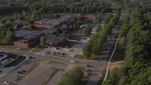 Overhead of school during dropoff | Stock Video | Pond5