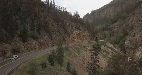 Overhead shot of a car driving with a st... | Stock Video | Pond5