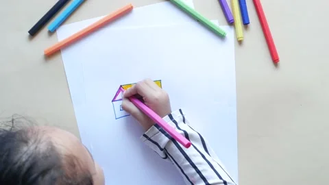 overhead shot of child girl drawing on p... | Stock Video | Pond5
