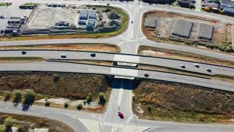 Overhead shot rotating left of Cars driv... | Stock Video | Pond5