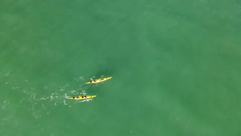Overhead Shot Of Yellow Kayaks Rowing In... | Stock Video | Pond5