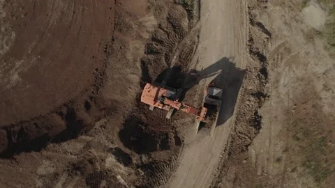 Overhead top view of excavator loading t... | Stock Video | Pond5