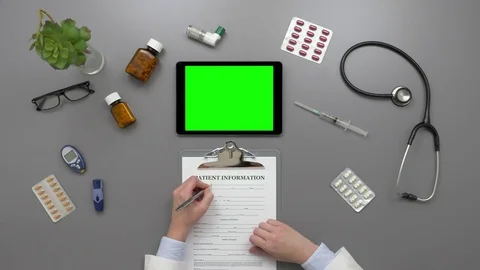 Overhead Top View Of Female Doctor Filli... | Stock Video | Pond5
