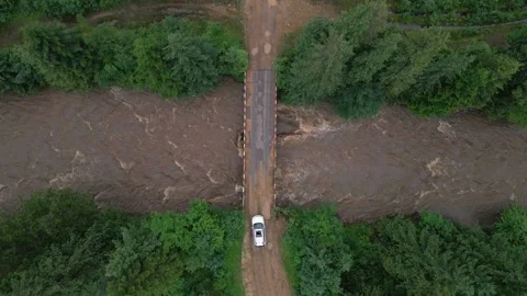overhead top view suv car crossing river... | Stock Video | Pond5