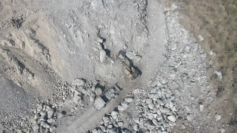 overhead vertical aerial view of an exca... | Stock Video | Pond5