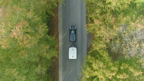 Overhead View Of A Car With Trailer Driv... | Stock Video | Pond5