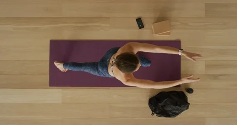 overhead view flexible yoga woman practi... | Stock Video | Pond5