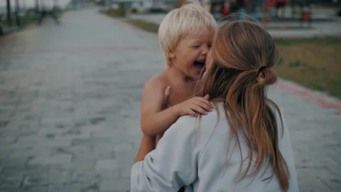 Overjoyed baby boy running to mother hug... | Stock Video | Pond5