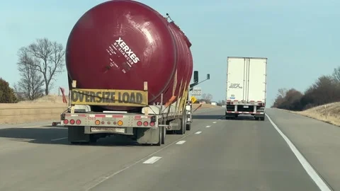 OVERSIZE LOAD sign on back of Semi truck... | Stock Video | Pond5