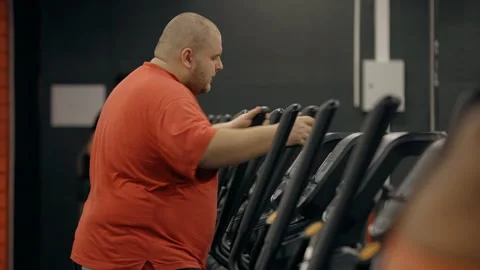 Overweight man with strong determination... | Stock Video | Pond5