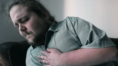 Overweight person having heart attack. A... | Stock Video | Pond5