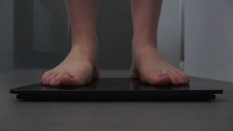 Overweight Woman On Scale Stock Footage ~ Royalty Free Stock Videos | Pond5