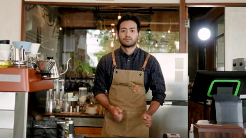 Owner of the Indian coffee shop is stand... | Stock Video | Pond5