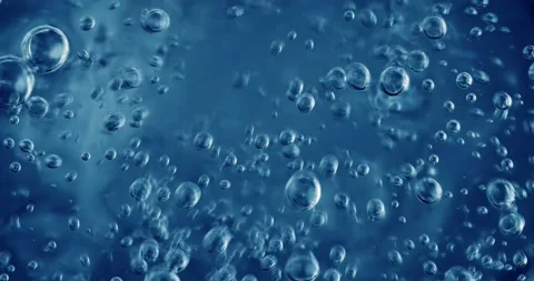Oxygen bubbles in water on a blue abstra... | Stock Video | Pond5
