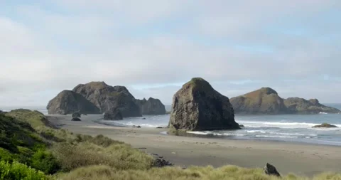 Pacific Ocean shore / beach with landsca... | Stock Video | Pond5