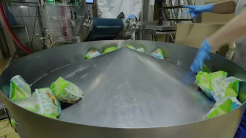 Packaging cottage cheese into cardboard ... | Stock Video | Pond5