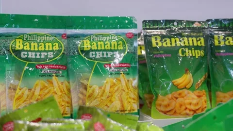 Packs of Philippine Banana Chips on disp... | Stock Video | Pond5