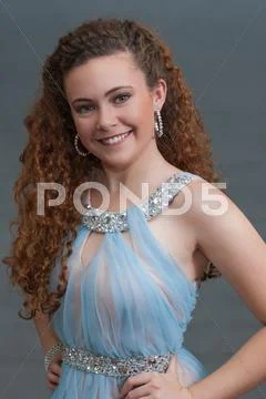 Pageant teen standing with hands on hips Stock Photo #61036815