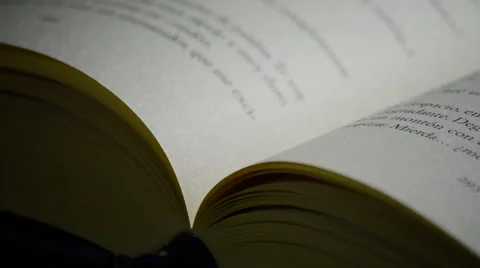 Pages of open book in spanish rotating a... | Stock Video | Pond5