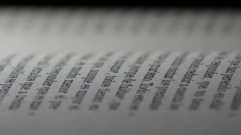Pages written in a open book, rotation | Stock Video | Pond5