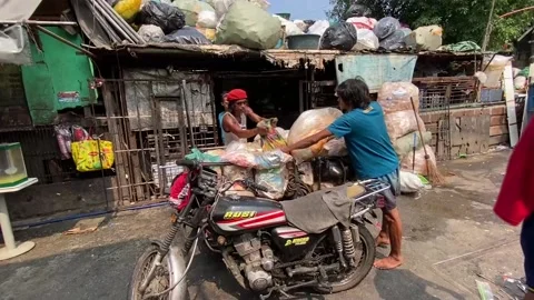 Pagpag: Recycled landfill food becomes e... | Stock Video | Pond5