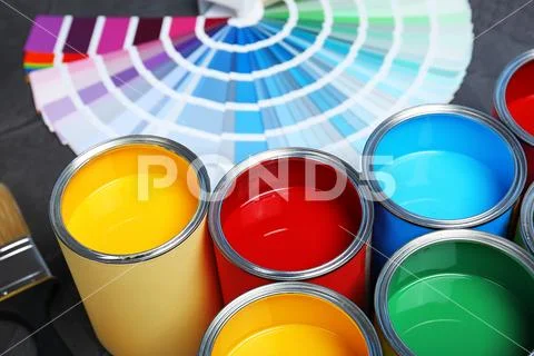 Paint cans and color palette samples on table, closeup ~ Premium Photo ...