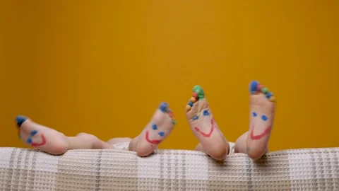 Paint fun feet kids with smiley drawing ... | Stock Video | Pond5