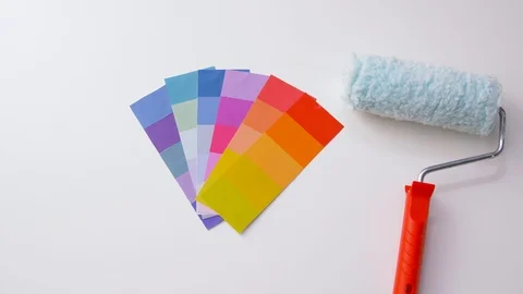 paint roller and color palette on white ... | Stock Video | Pond5