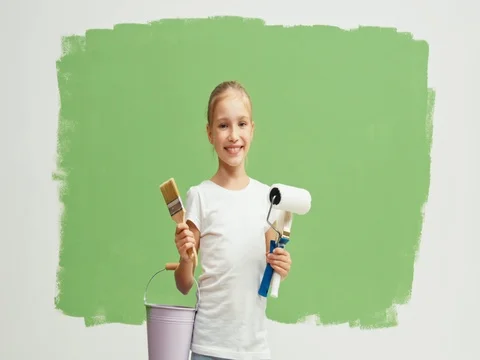 Painter on the background of green scree... | Stock Video | Pond5