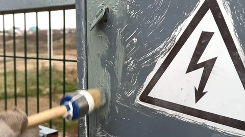 Painting the electrical panel with gray ... | Stock Video | Pond5
