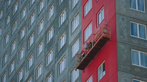 Painting the facade of a multi-storey ho... | Stock Video | Pond5