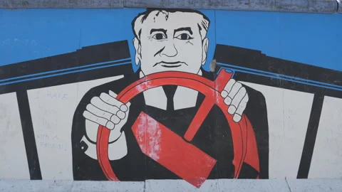 The painting of Gorbachev on the Berlin ... | Stock Video | Pond5