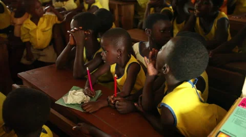 PAKRO CLASSROOM: SIX YOUNG STUDENTS SIT ... | Stock Video | Pond5
