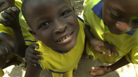 PAKRO SCHOOL CHILDREN IN YELLOW SMILE IN... | Stock Video | Pond5