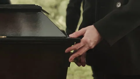 Pallbearers Carrying Casket along Cemete... | Stock Video | Pond5