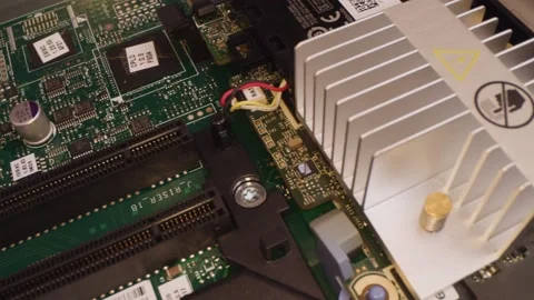 Pan across computer motherboard circuitr... | Stock Video | Pond5