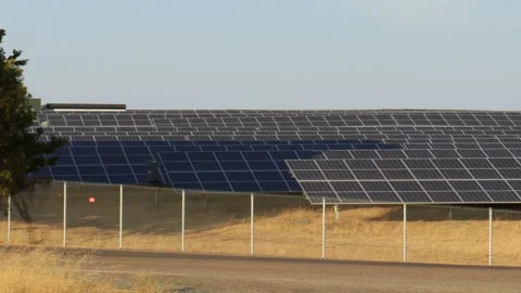 Pan Across Massive Field of Solar Panels... | Stock Video | Pond5