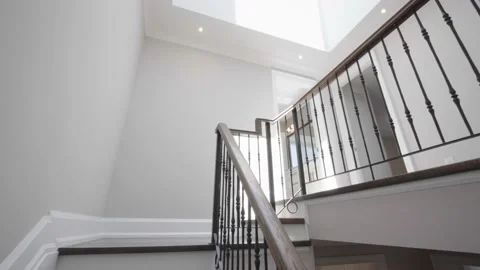 Pan and tilt shot from staircase to the ... | Stock Video | Pond5