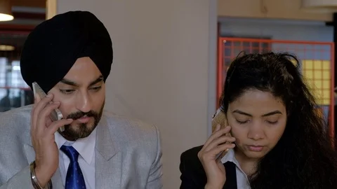 Pan down from portrait of two Indian col... | Stock Video | Pond5