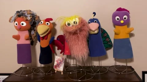 Pan Down of Puppet Stands | Stock Video | Pond5