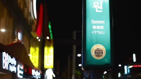 Pan down shot of Itaewon station sign | Stock Video | Pond5