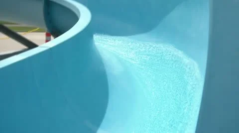 Pan of Inside Water Slide to Pool | Stock Video | Pond5