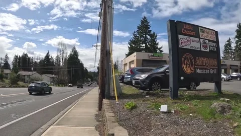 Pan of Marquee Sign and Mini-Mall in Uni... | Stock Video | Pond5