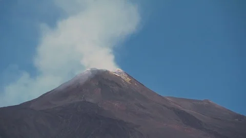 Pan old lava flow to see Steam & smoke c... | Stock Video | Pond5