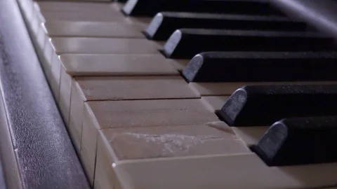 Pan of old piano keys on old piano | Stock Video | Pond5